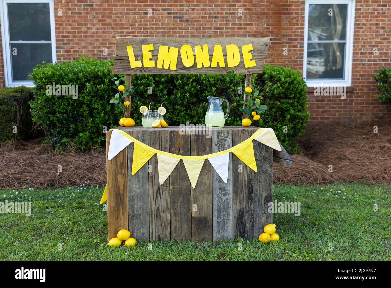 An empty lemonade stand ready for children to start selling lemonade on ...