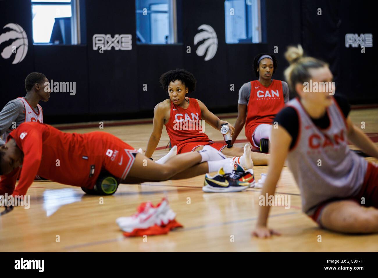 Nirra Fields stretches alongside team mates following Canada's senior ...