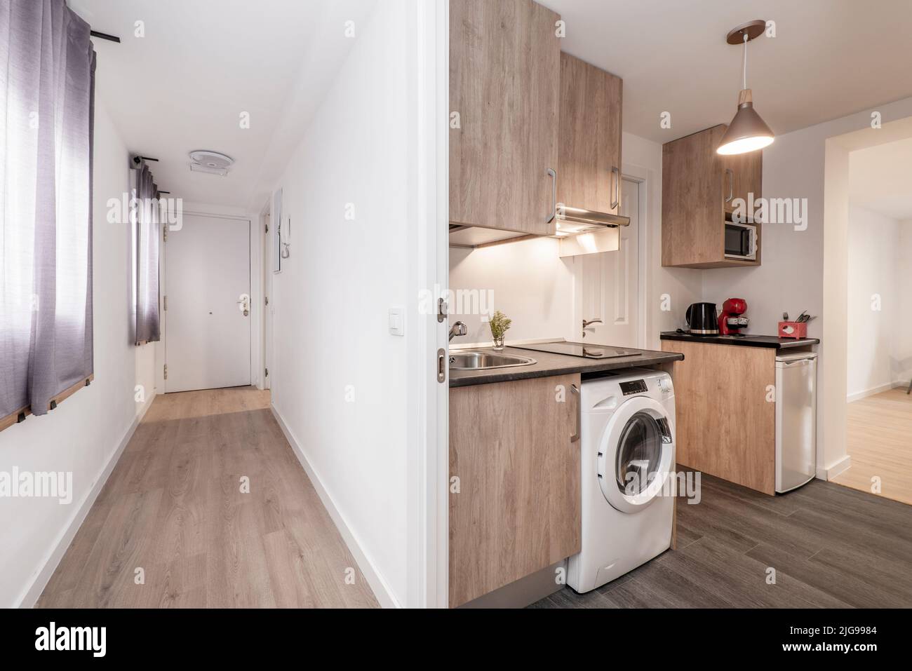 Corridor of a house with several doors and access to different rooms ...
