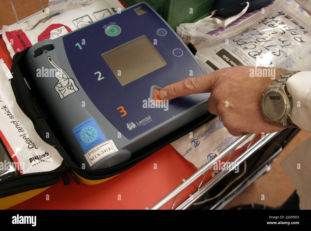 A defibrillator on an emergency table at a health center Stock Photo ...