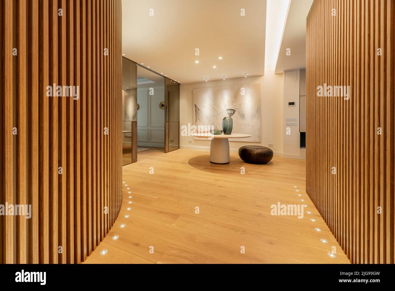 Hallway of a house with walls covered with latticework of vertical ...