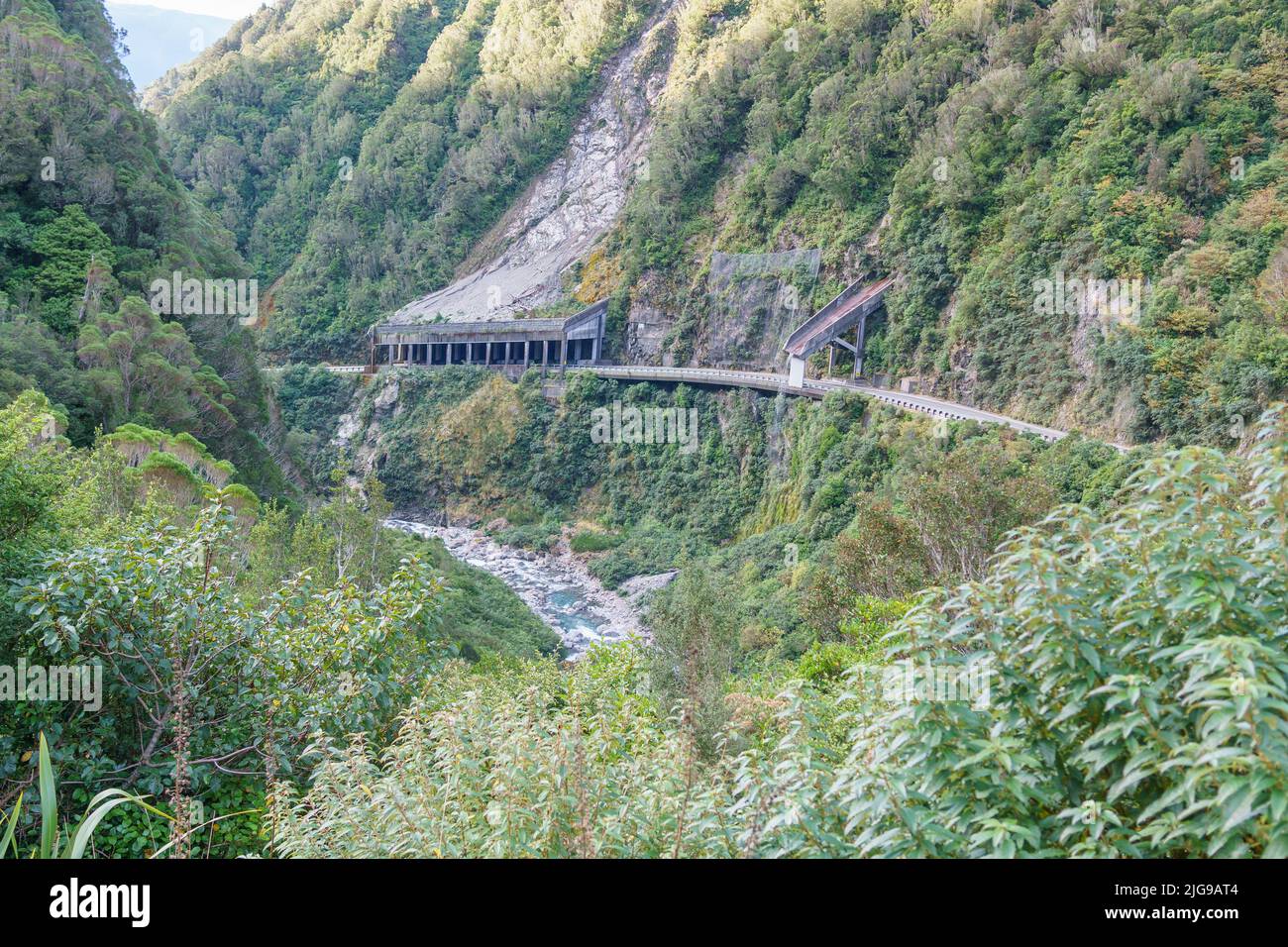 State High 76 passes Otira between bush clad steep hills and through ...