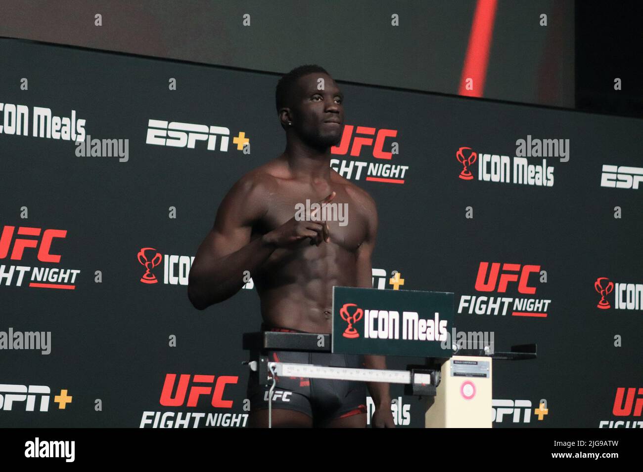 LAS VEGAS, NV - JULY 8: David Onama poses on the scale during the UFC ...