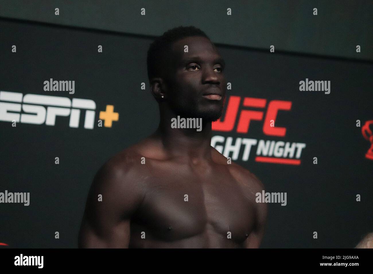 LAS VEGAS, NV - JULY 8: David Onama poses on the scale during the UFC ...