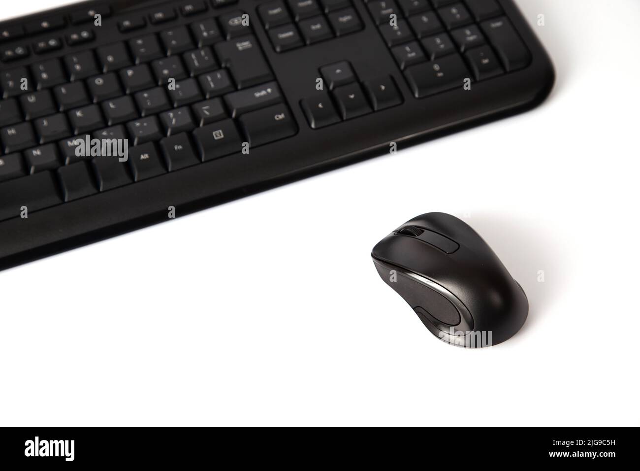 black keyboard and mouse isolated on white background Stock Photo - Alamy