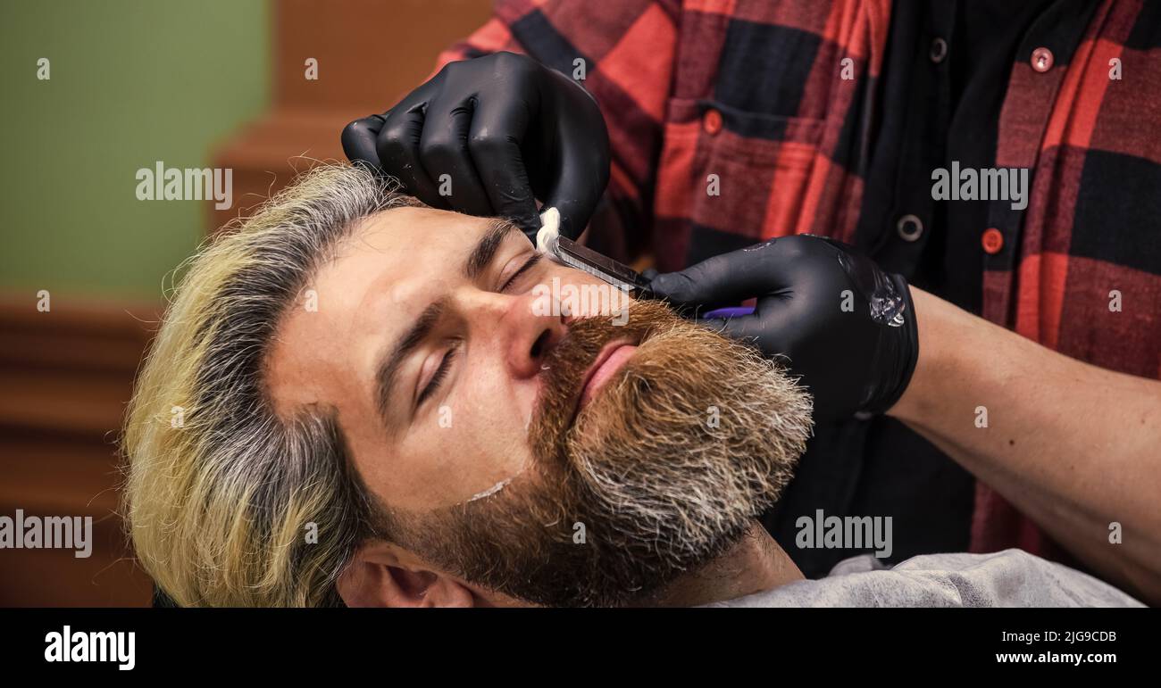 brutal bearded man at hairdresser salon with master, grooming Stock ...