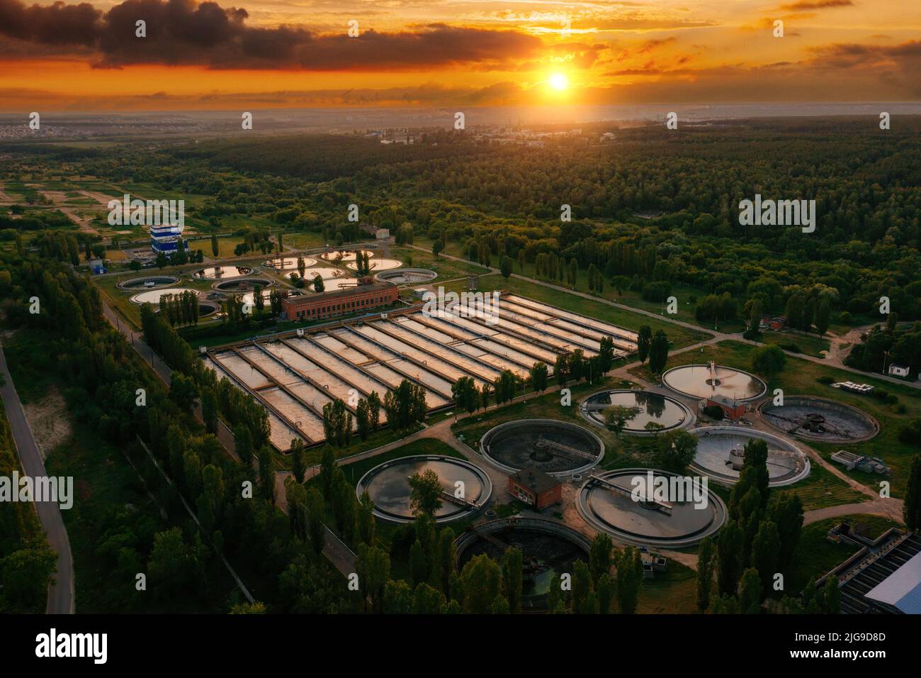 Modern sewage treatment plant, aerial view from drone at the evening ...