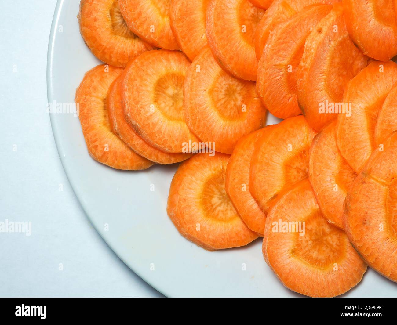 Sliced carrot. Carrot slices on a white background. Vegetarian food ...