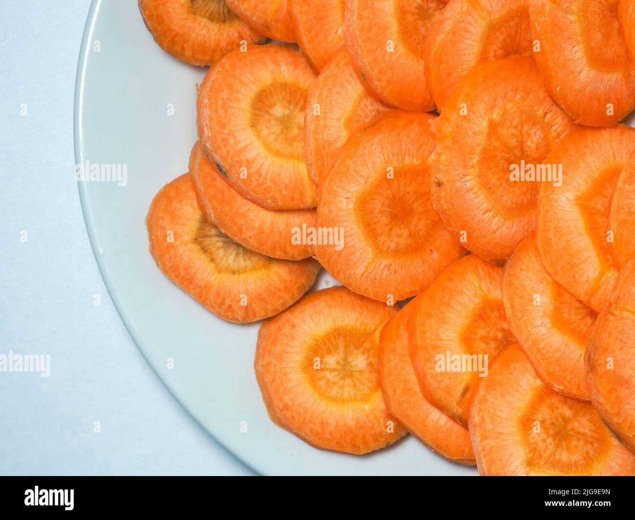 Sliced carrot. Carrot slices on a white background. Vegetarian food ...
