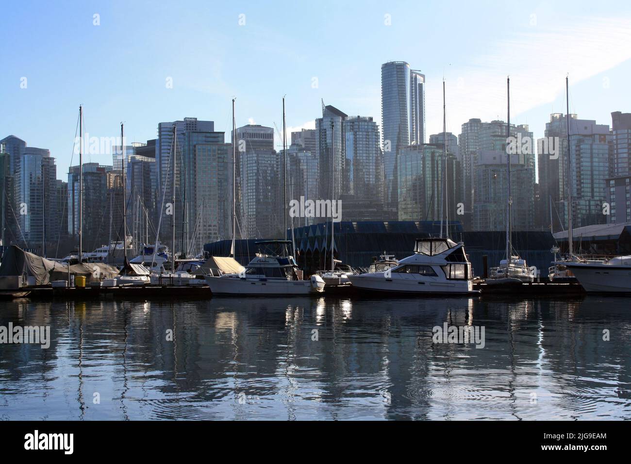 a lake with yachts and boats on the background of skyscrapers in Coal ...