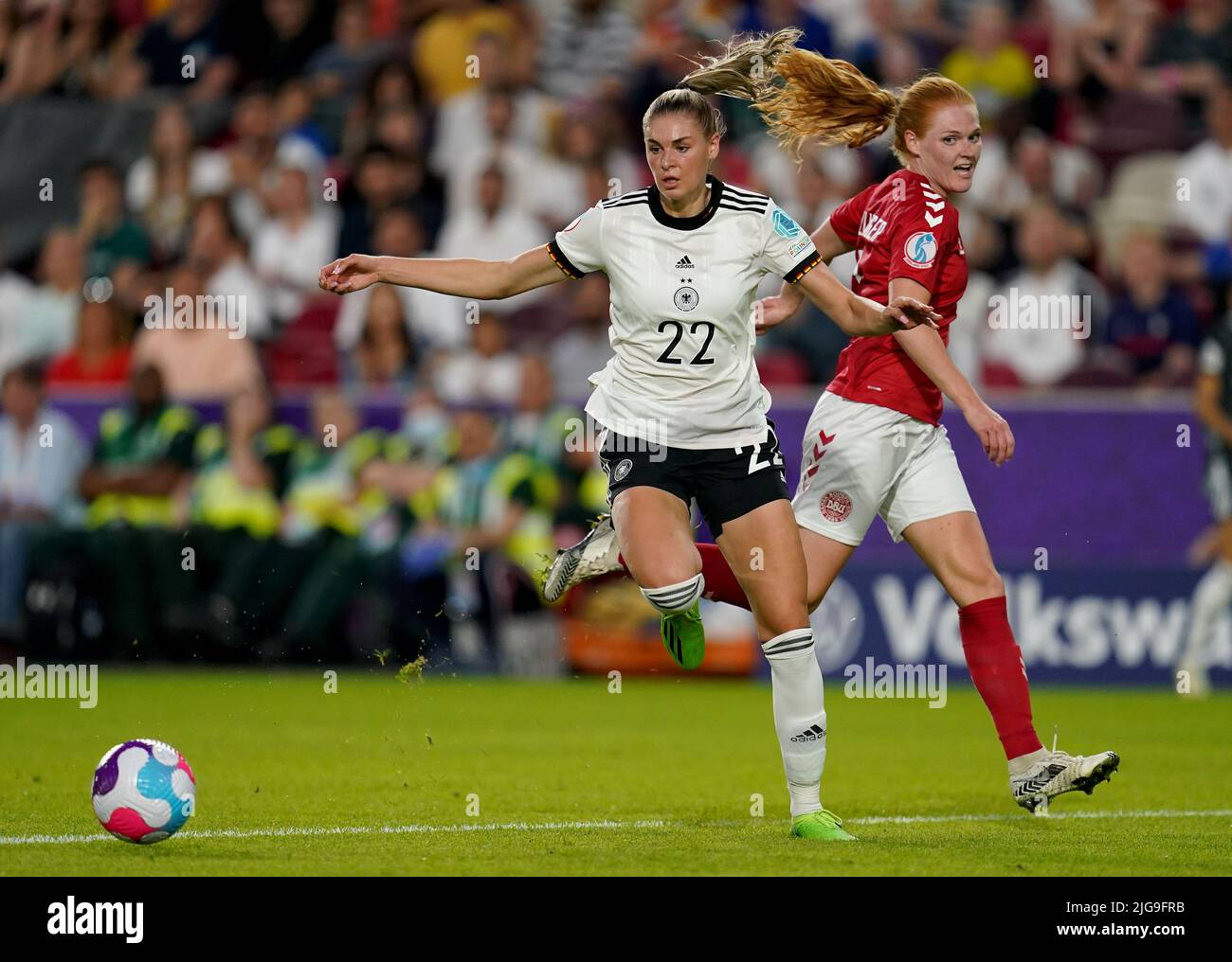 Germany’s Jule Brand gets past Denmark’s Stine Pedersen during the UEFA ...