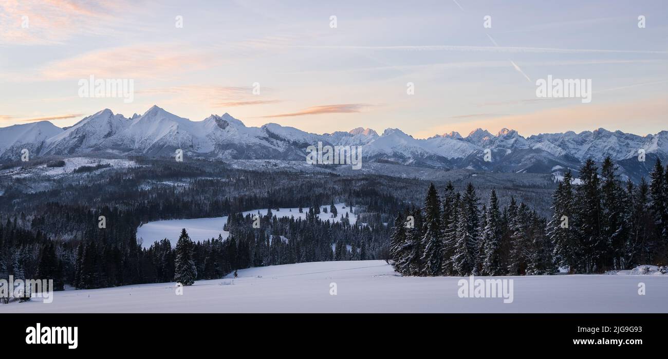 Beautiful winter landscape with snowy mountains and forest during ...