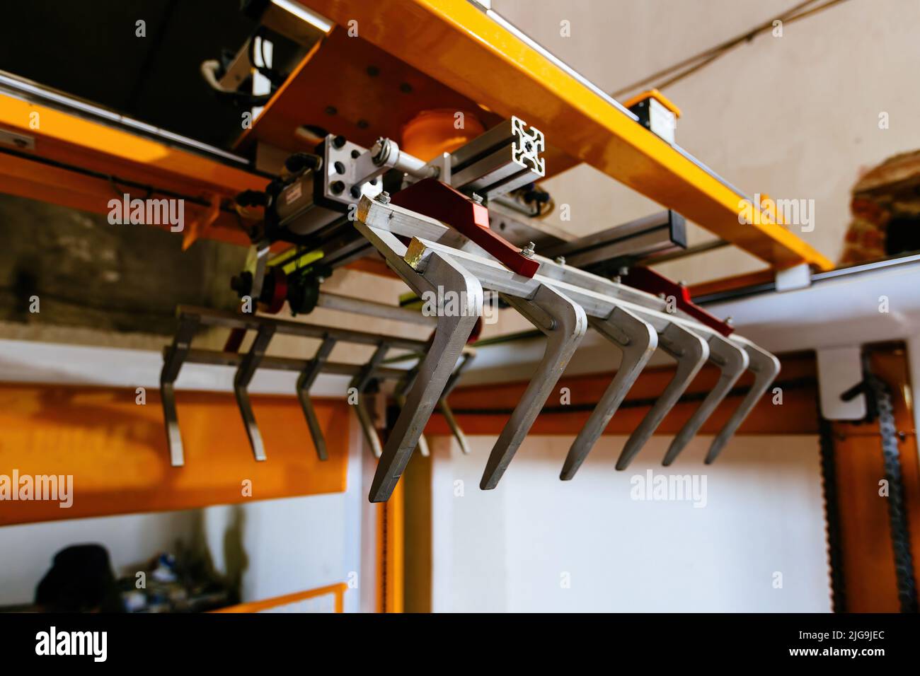 Lifting jaw grip of bag stacking machine Stock Photo - Alamy