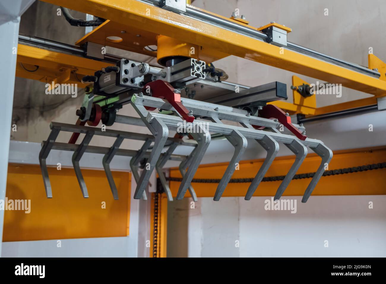 Lifting jaw grip of bag stacking machine Stock Photo - Alamy