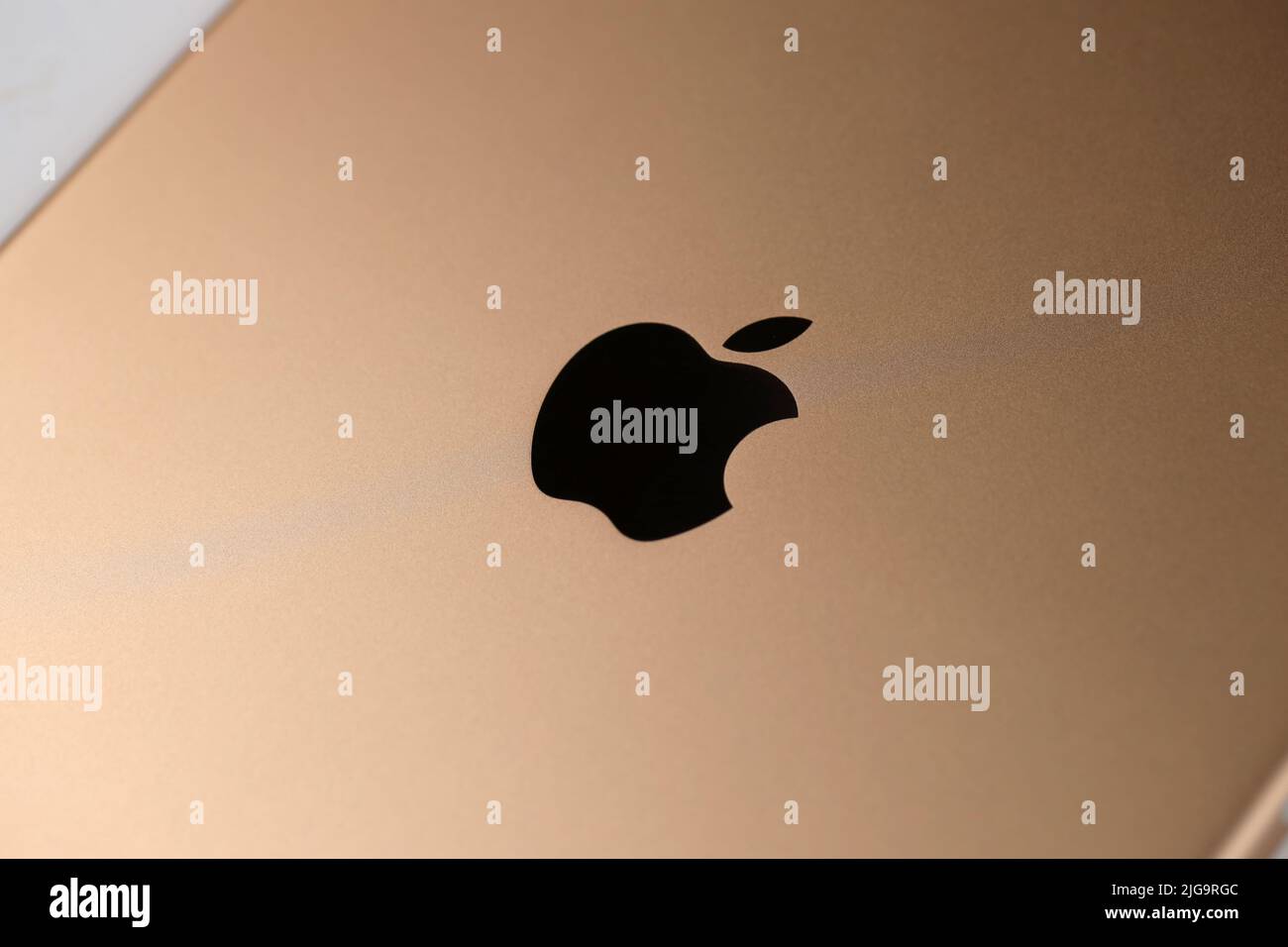 KHARKIV, UKRAINE - JANUARY 27, 2021: Brand new Apple iPad golden body ...