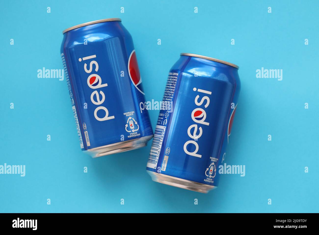 TERNOPIL, UKRAINE - MAY 28, 2022: Cold Pepsi drink cans. Pepsi is a ...