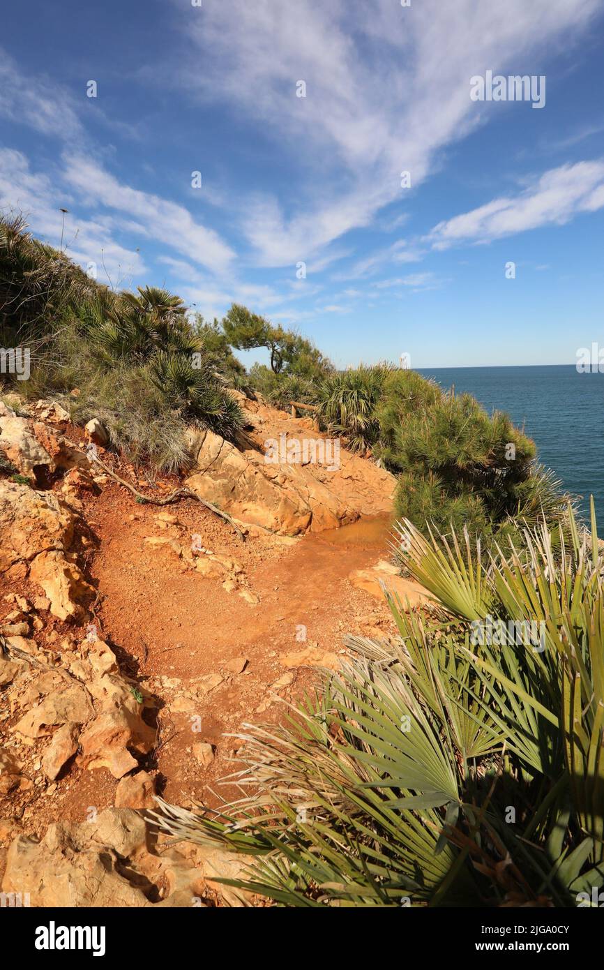 Hidden beach by the ocean sea with natural caves, sand and cliff Stock ...