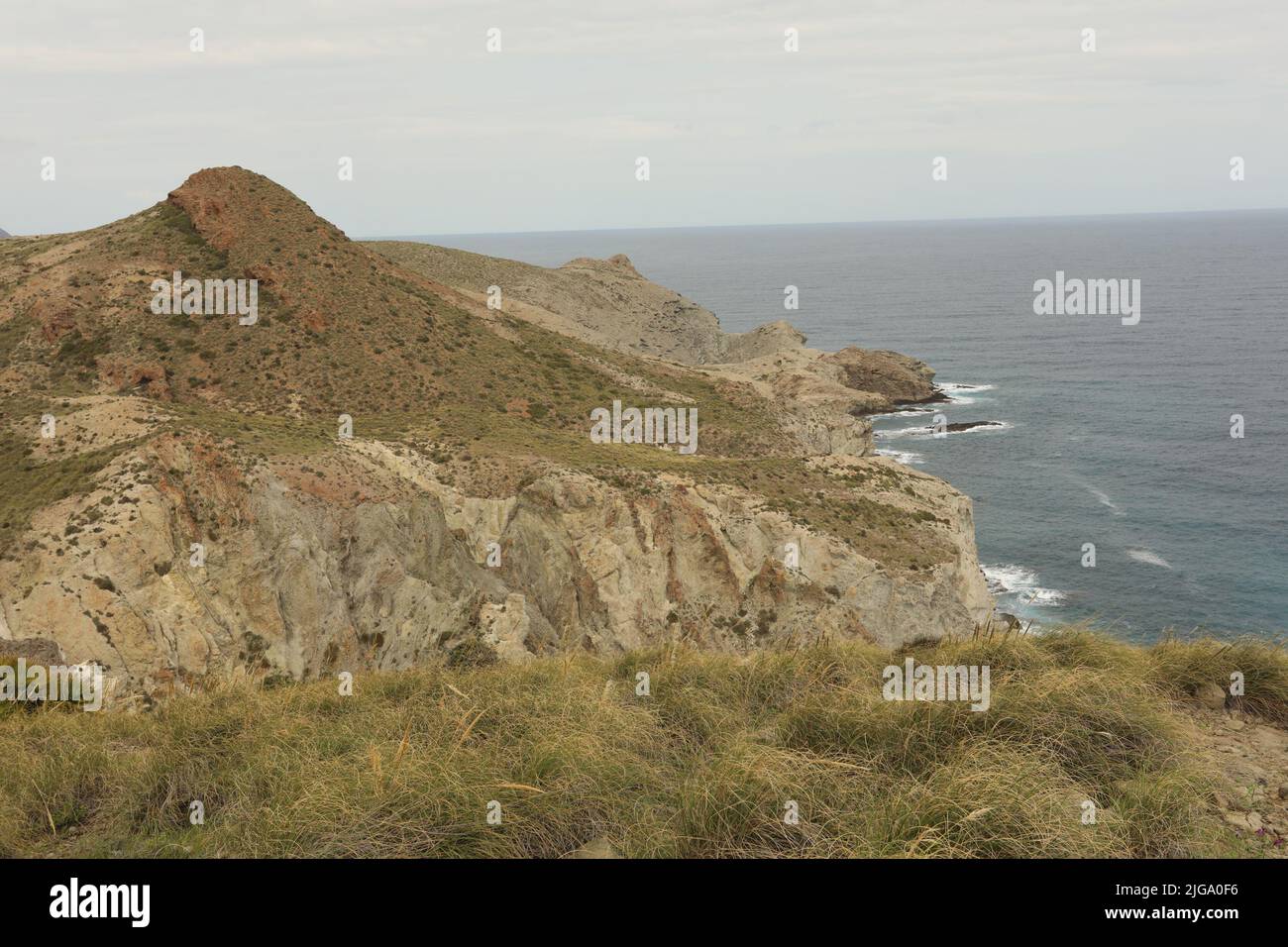 Hidden beach by the ocean sea with natural caves, sand and cliff Stock ...