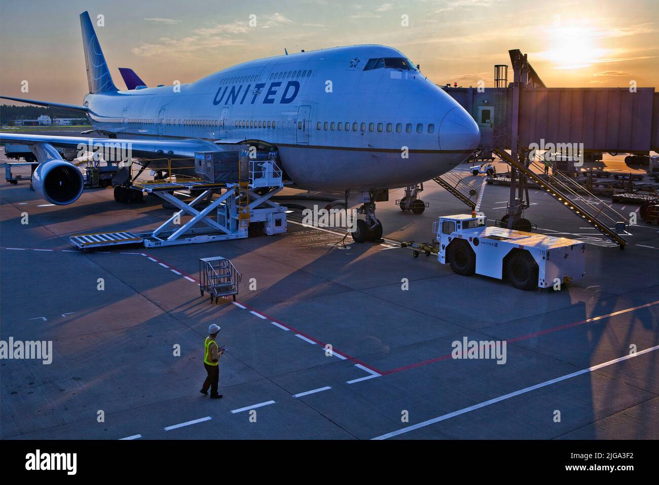747 jetliner loading at gate at Narita International Airport in Narita ...