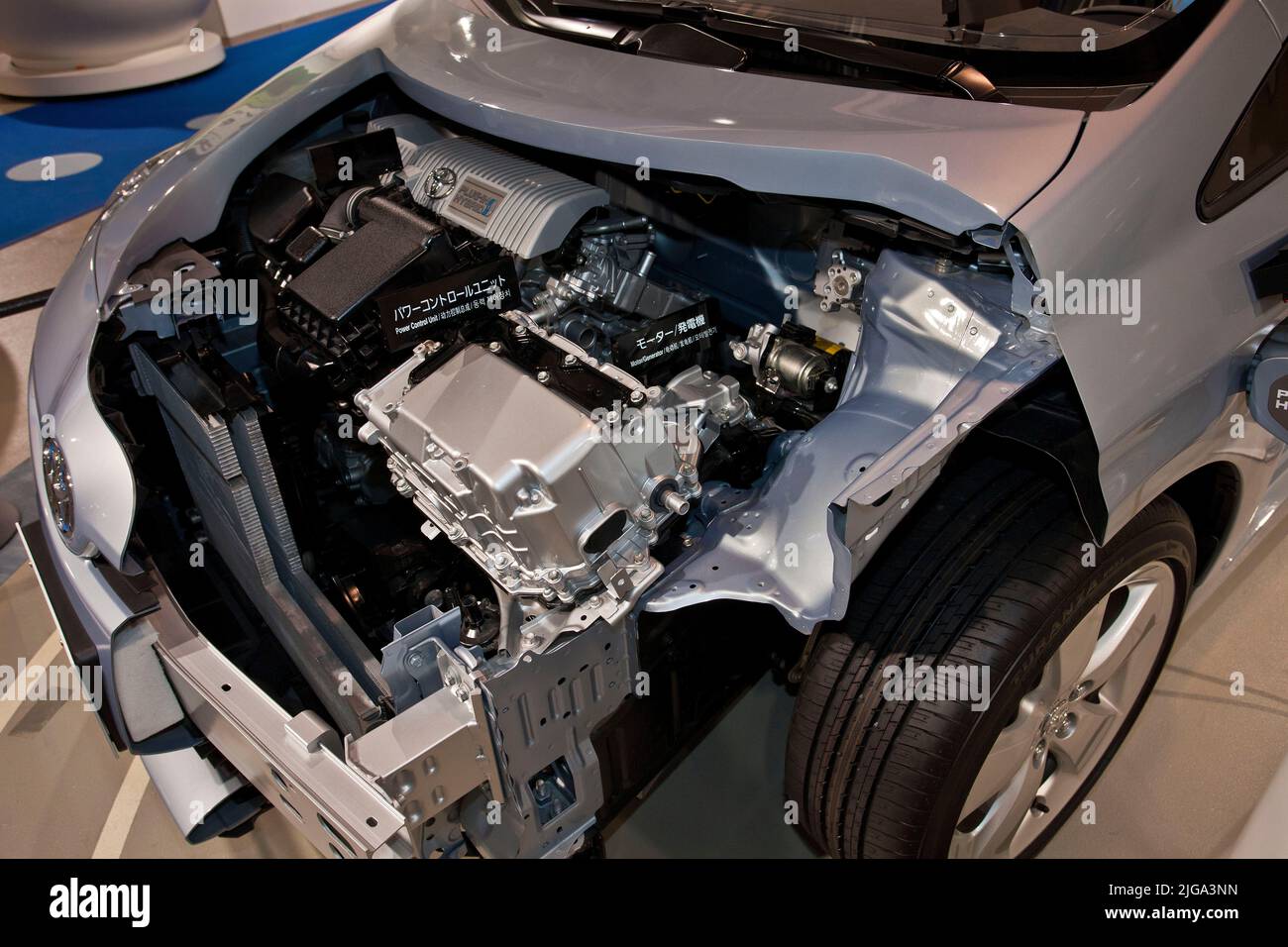 Cut-away view engine compartment Plug-in-Hybrid car Toyota showroom ...