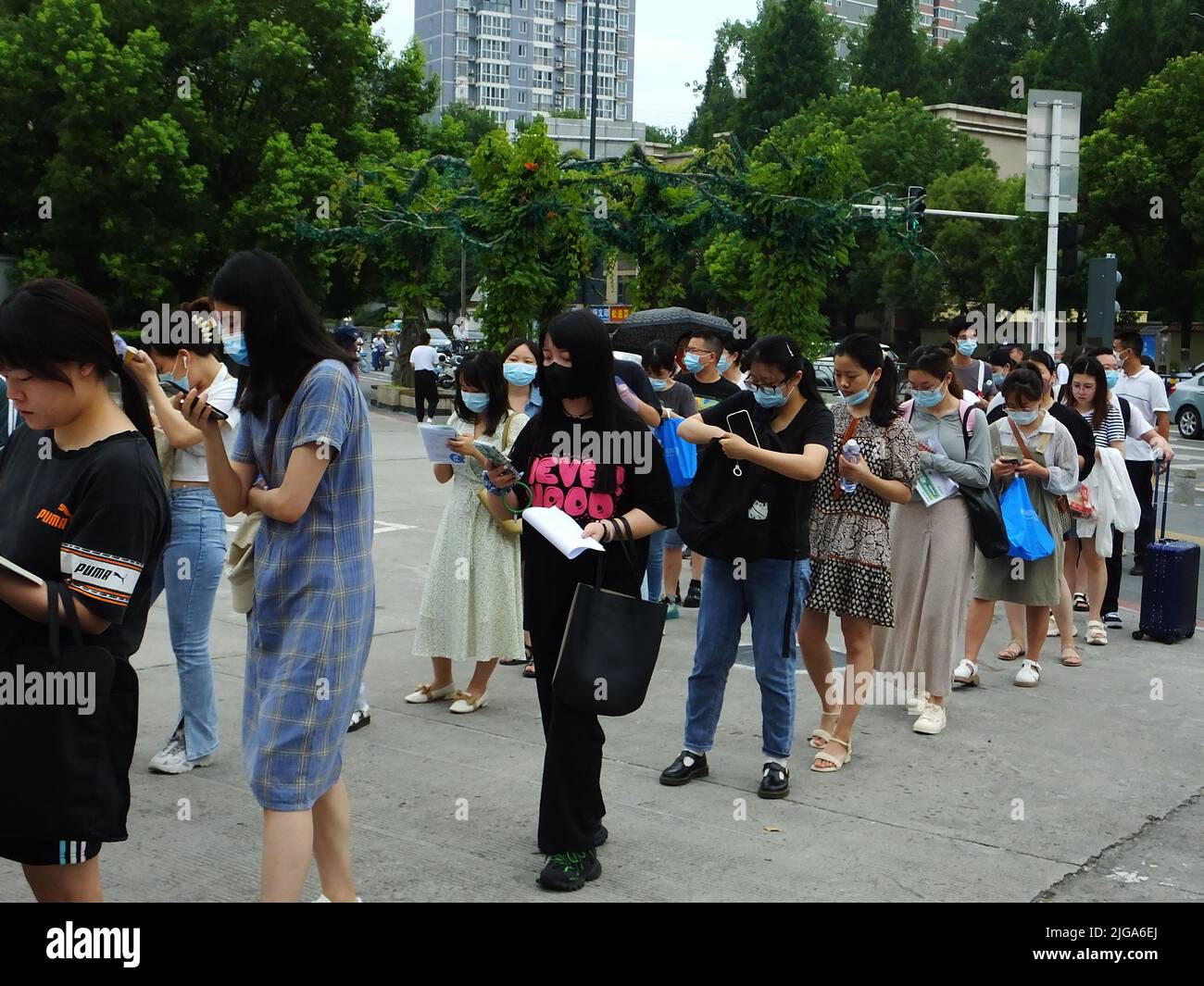 YICHANG, CHINA - JULY 9, 2022 - Candidates queue up to take the 2022 ...