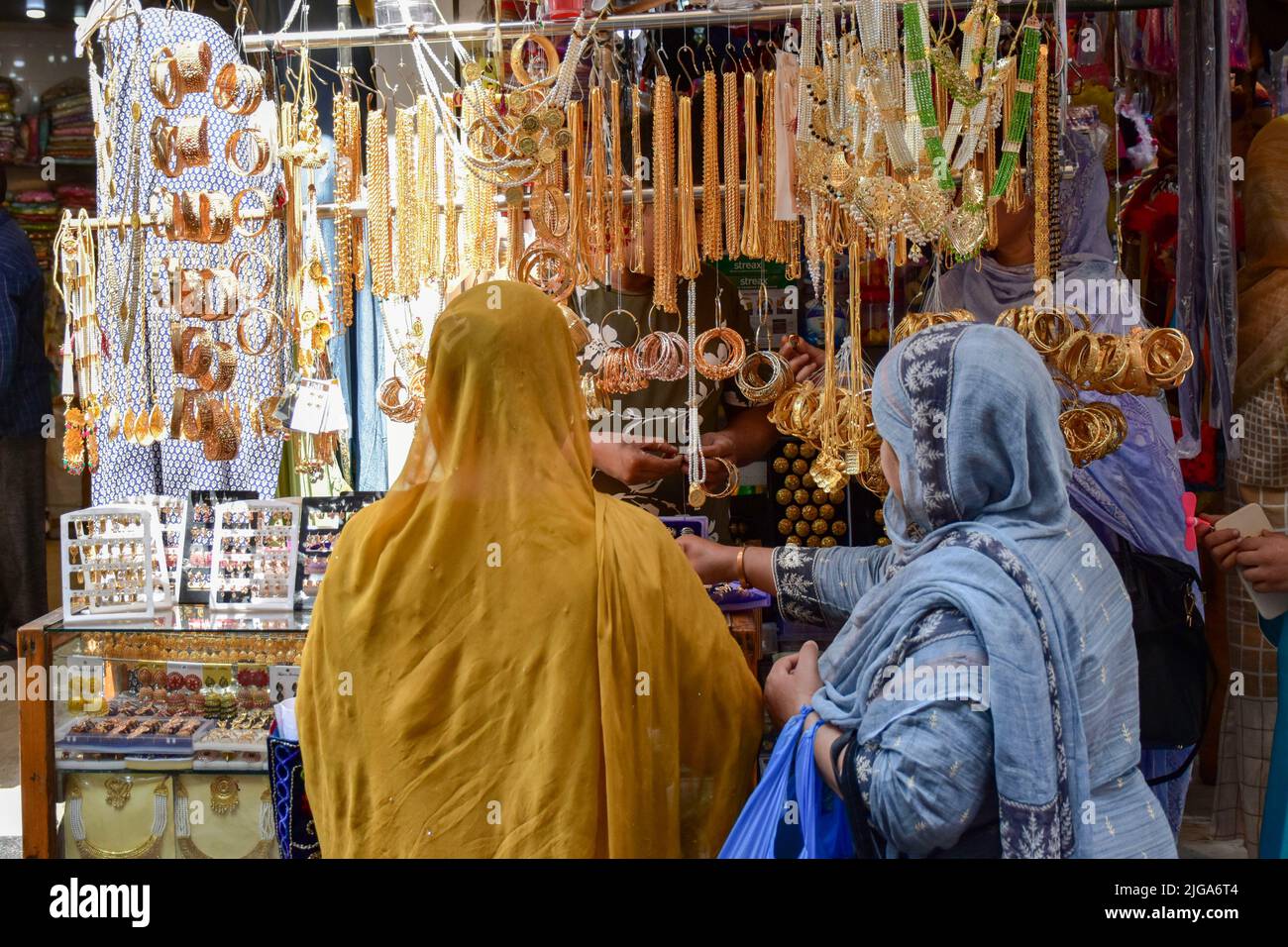 Srinagar, India. 08th July, 2022. Kashmiri women shop at a jewelry ...