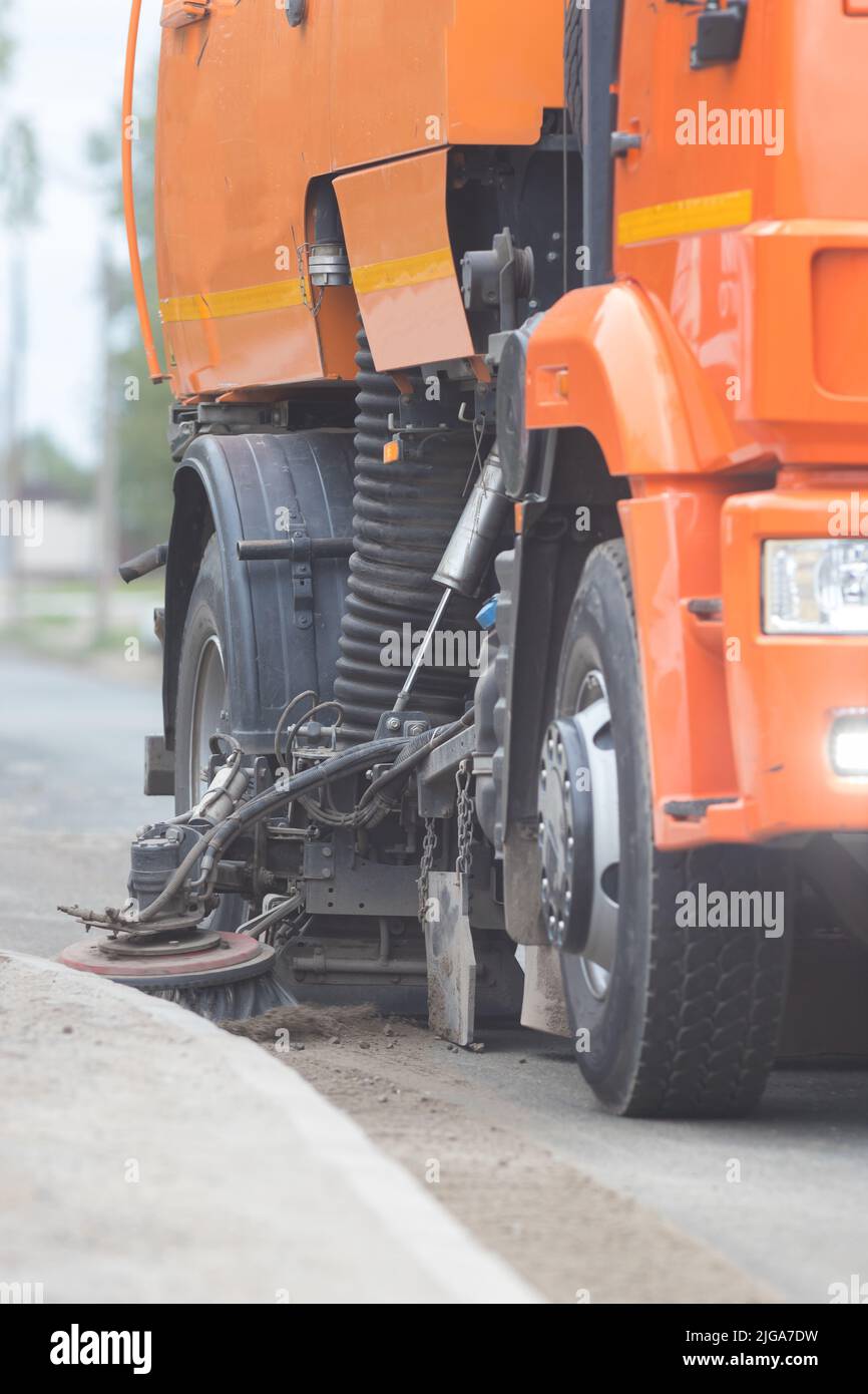 Big orange machine clears asphalt hi-res stock photography and images ...