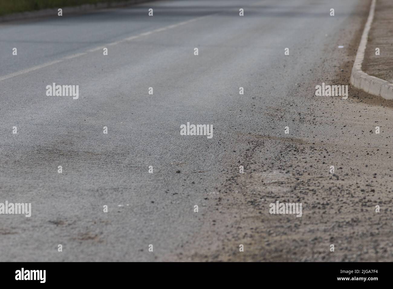 Light grey asphalt on the new road Stock Photo - Alamy