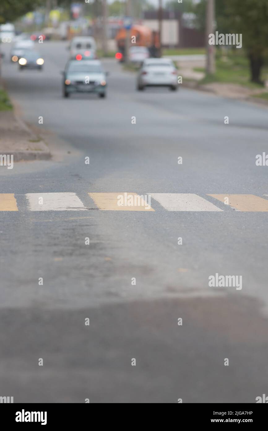 zebra - empty pedestrian crossing on the street. side view Stock Photo ...