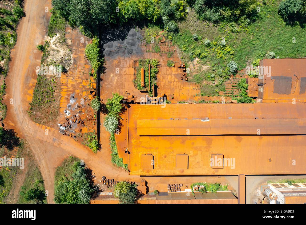 Industrial. Aerial view of large roof of factory. Drone shot from above ...