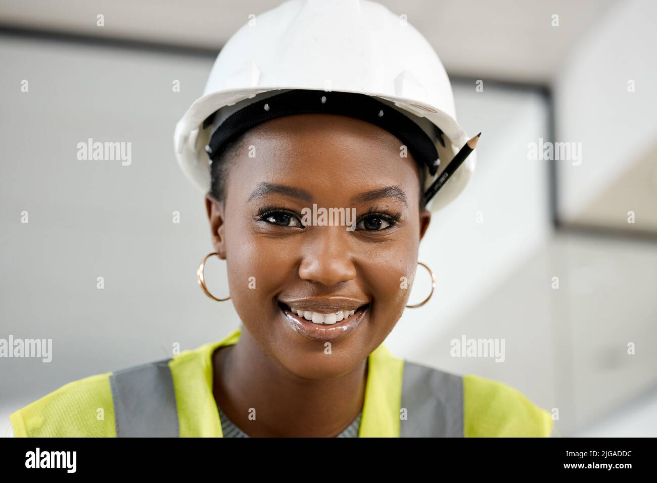 Young engineer female helmet hi-res stock photography and images - Alamy