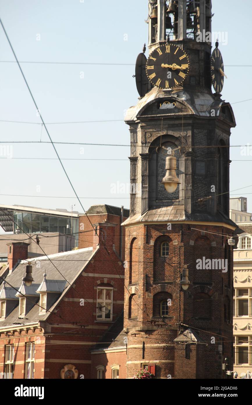 An old clock tower in the city of Amsterdam in the Netherlands Stock ...