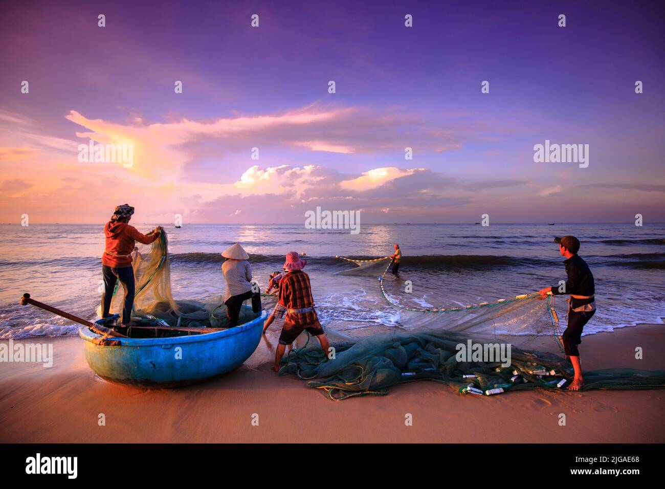 Unknown Fishermen who pull up th are the fishing nets khi sunrise. This ...
