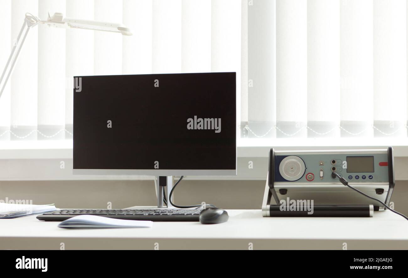 Radon gas radiation detector with computer monitor. testing equipment ...