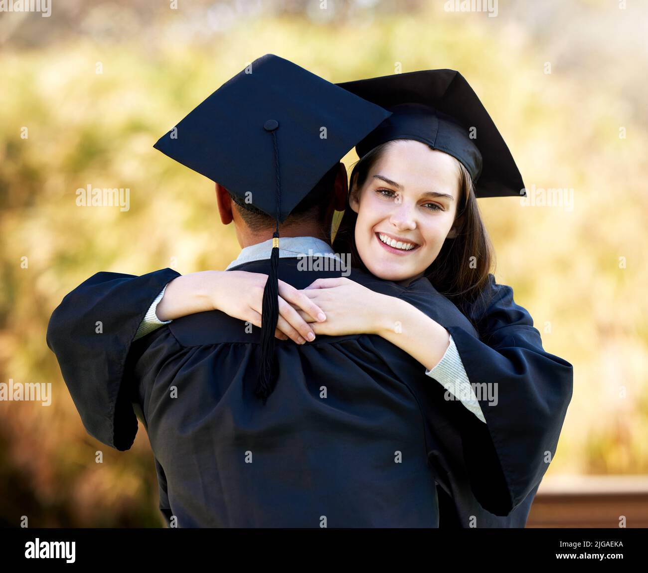 Young couple on graduation day hi-res stock photography and images - Alamy