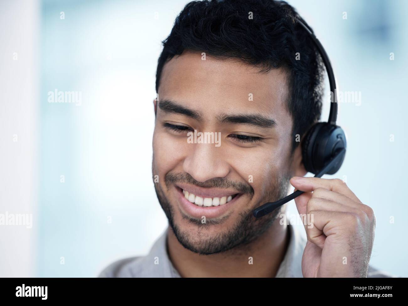 Thank you for calling us. a handsome young customer service agent ...