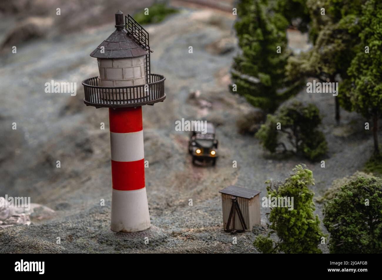 Toy representation of a military vehicle approaching a lighthouse Stock ...