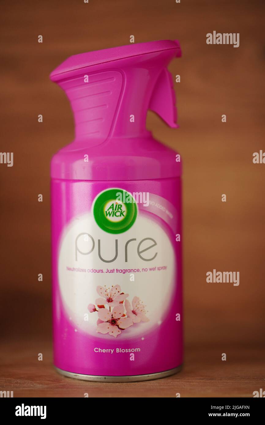 A vertical closeup of Airwick Pure air refresher with flower aroma in a ...