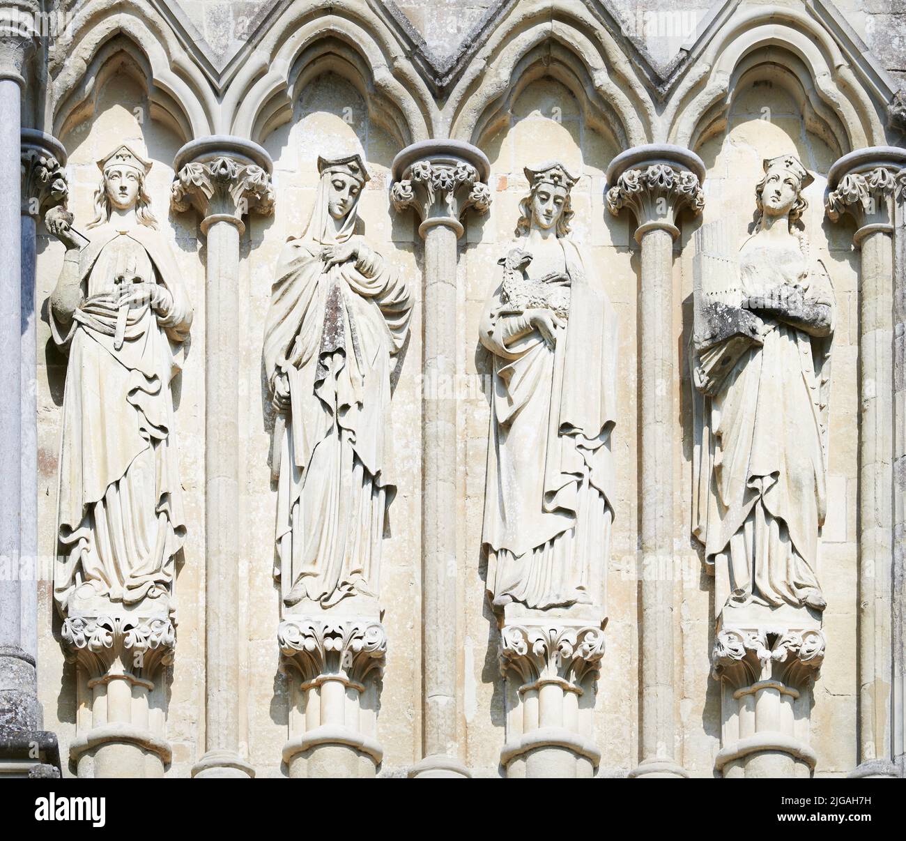 A collection of four statues on the west front wall of the thirteenth ...