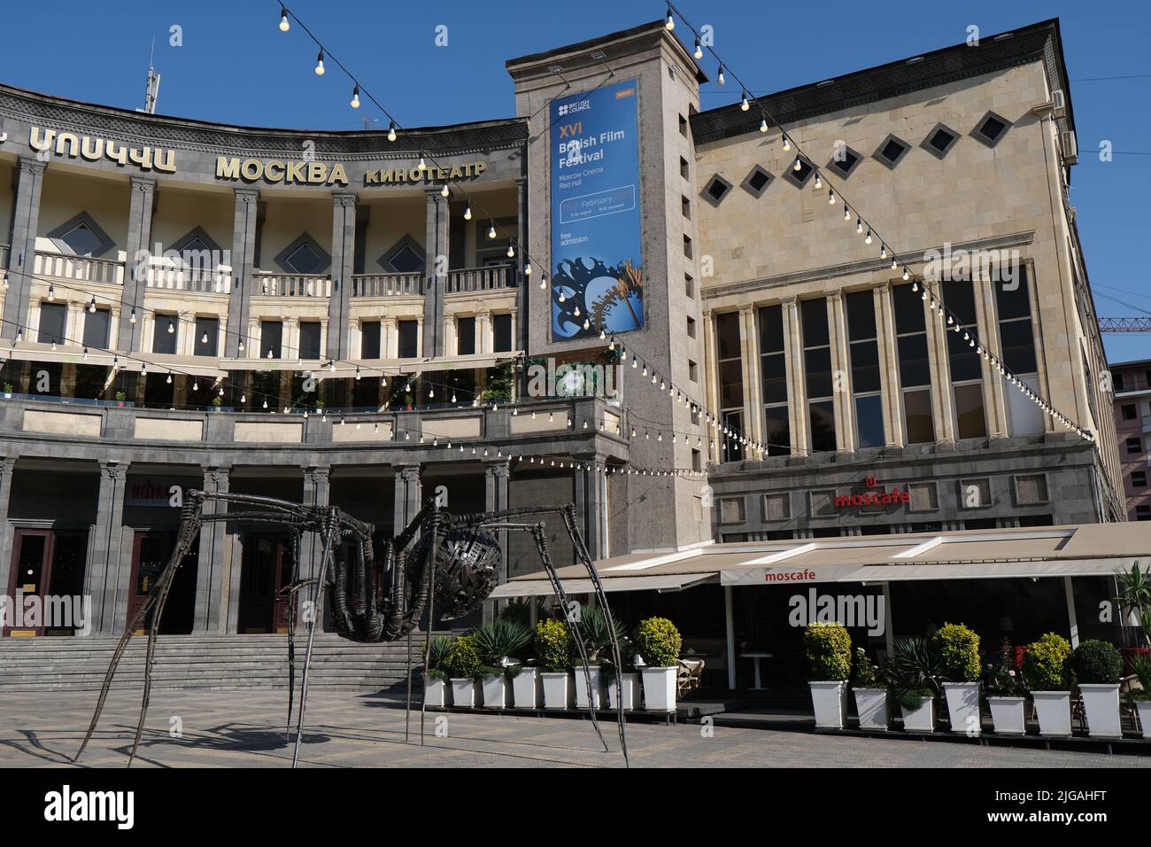 An architecture of Yerevan center Moscow cinema in front of spider ...