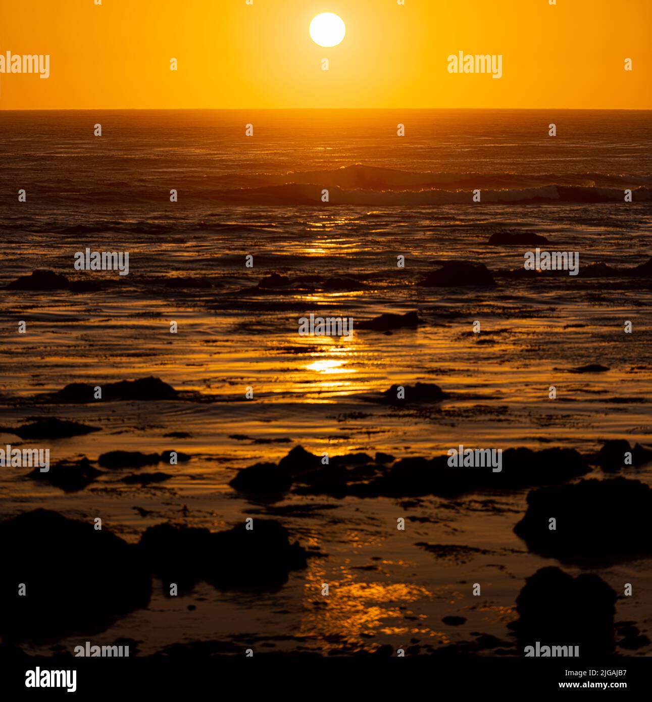 Sunset over pacific ocean at Big sur coast in California, United States ...