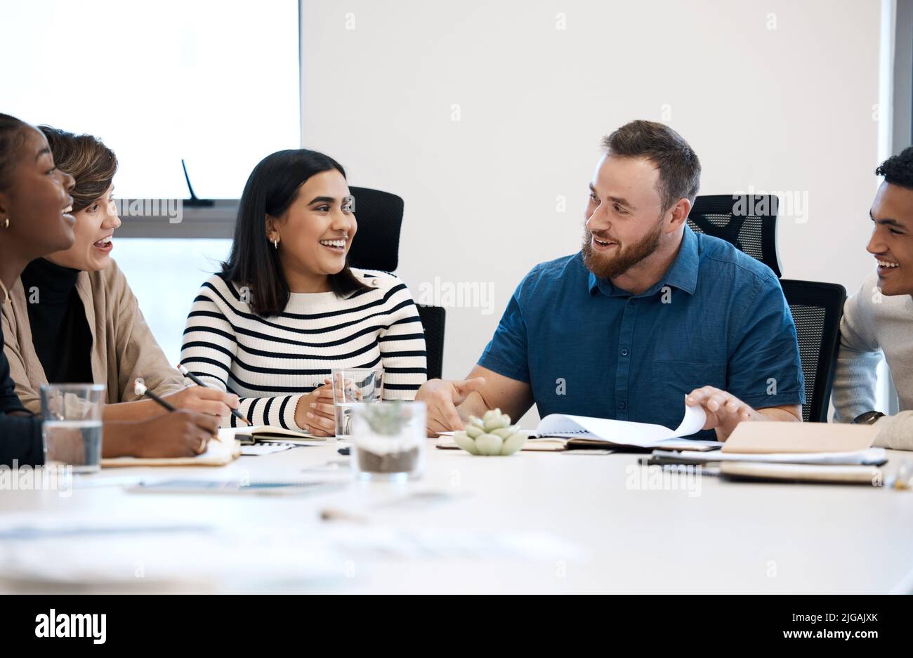 Planning for a successful year. a group of business people during a ...