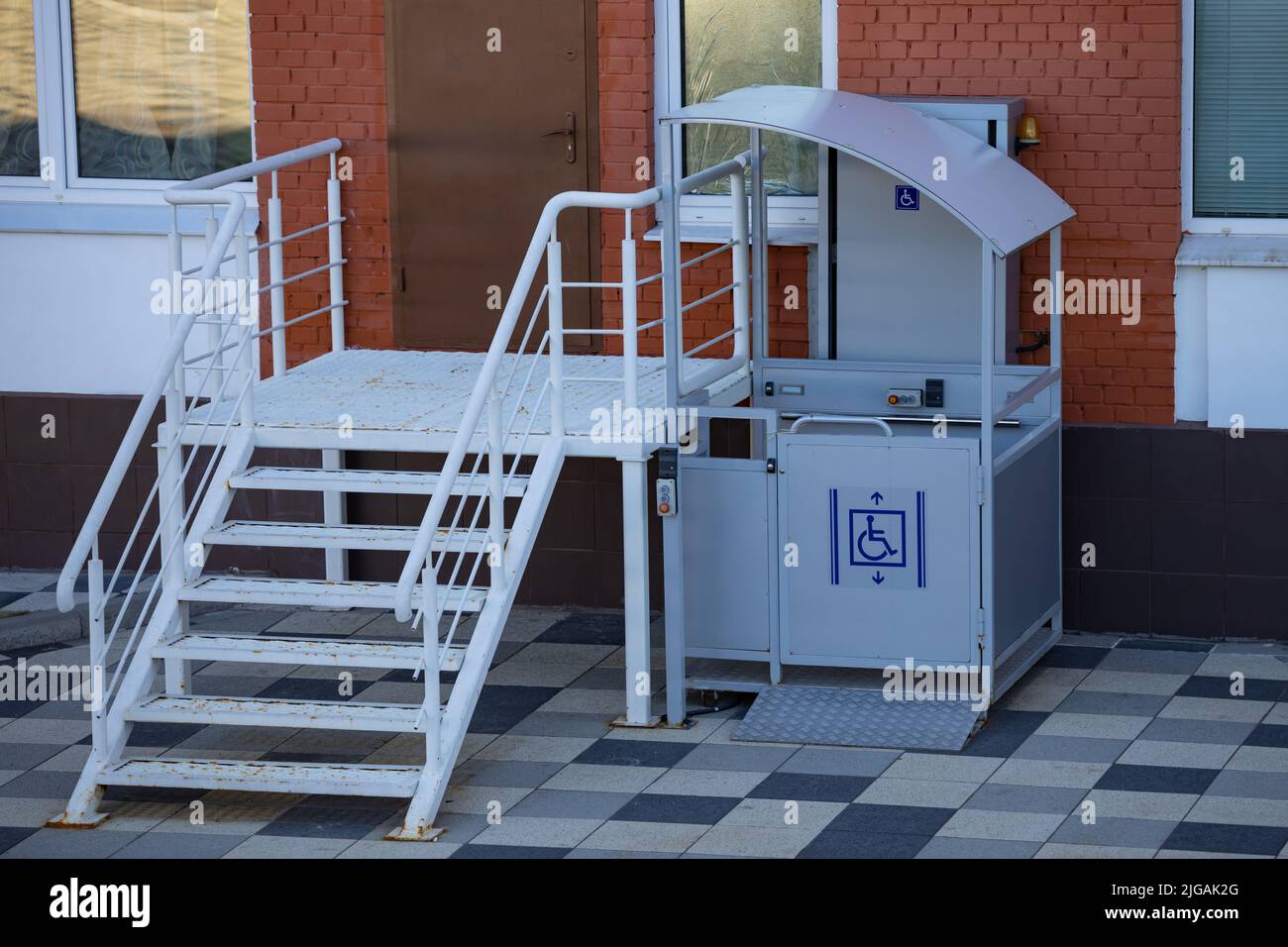 the entrance to the building is equipped with a lift for the disabled ...