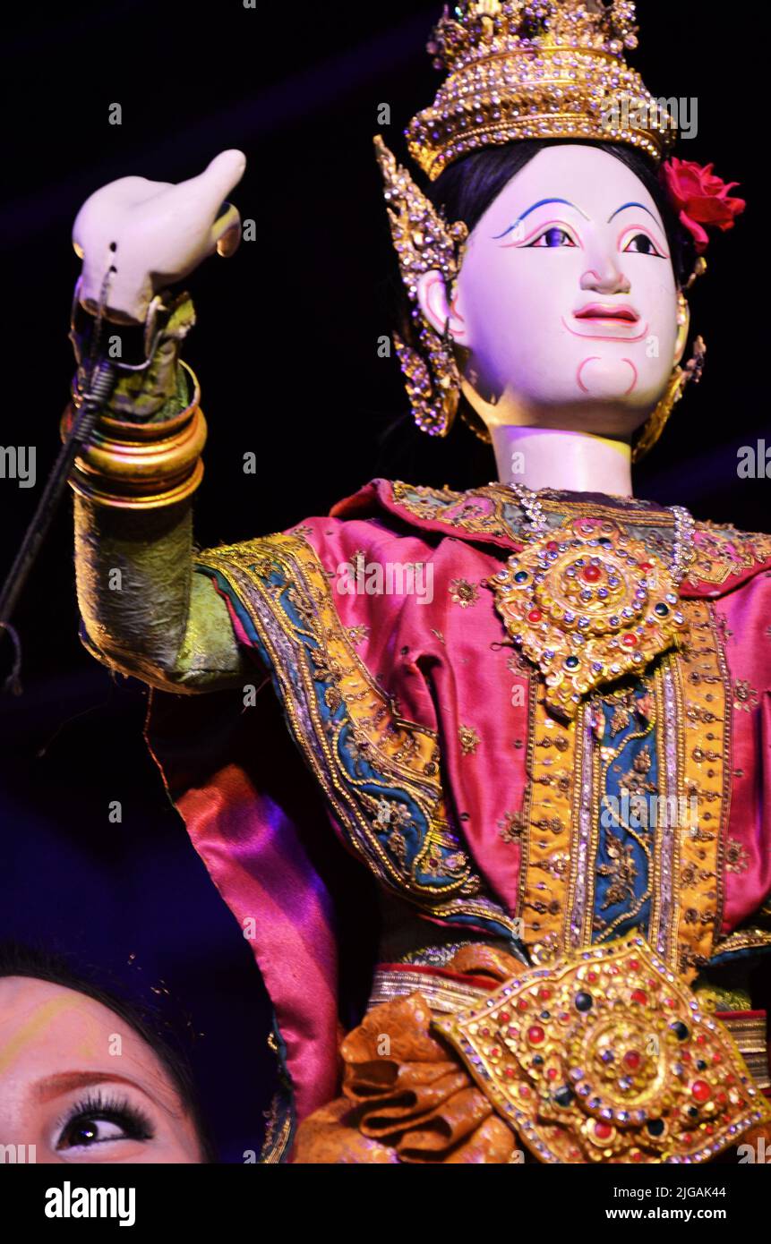 Thai professional puppeteer or Puppet master manipulate playing acting ...