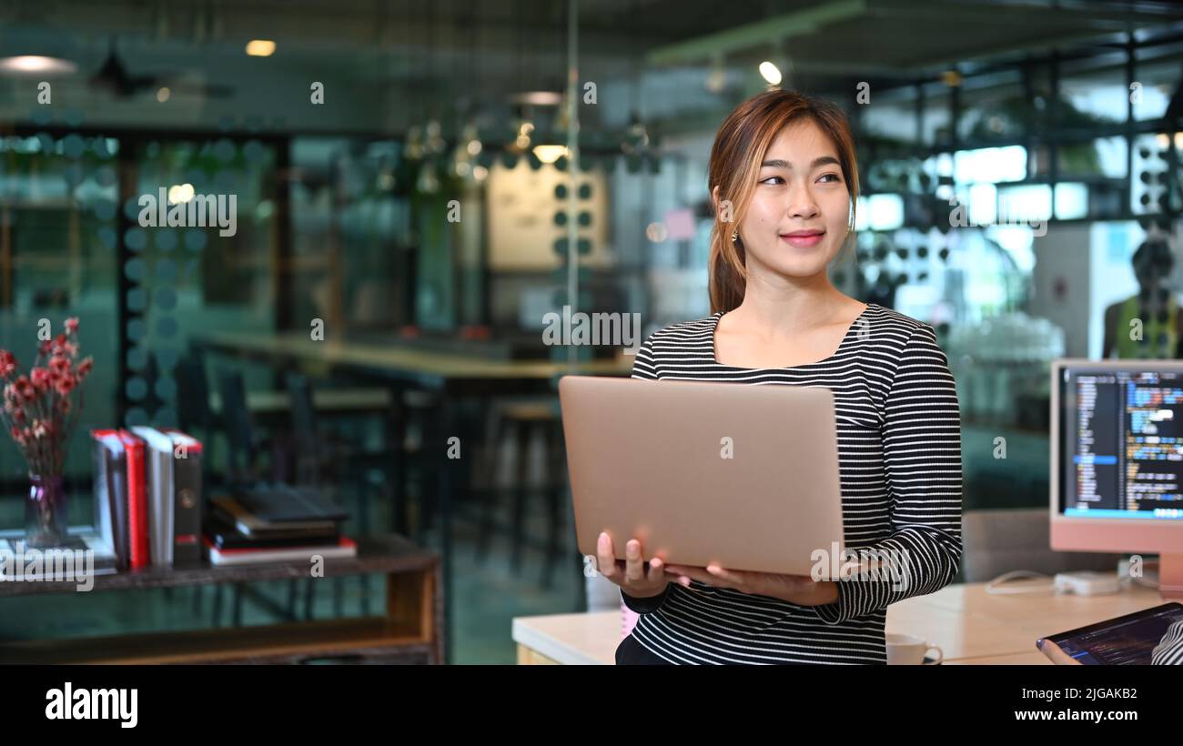 Young professionals web developer coder using laptop computer while ...