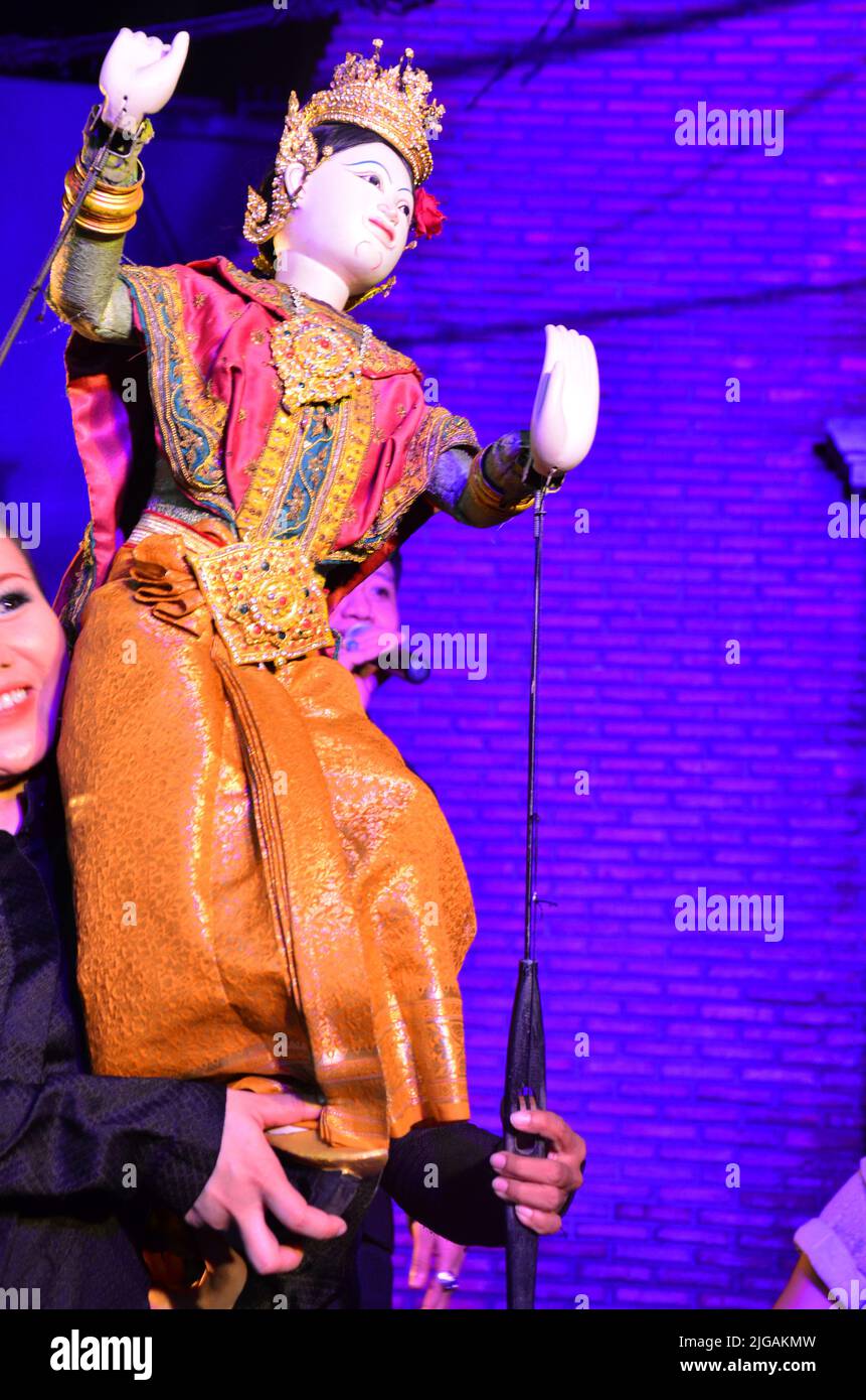 Thai professional puppeteer or Puppet master manipulate playing acting ...