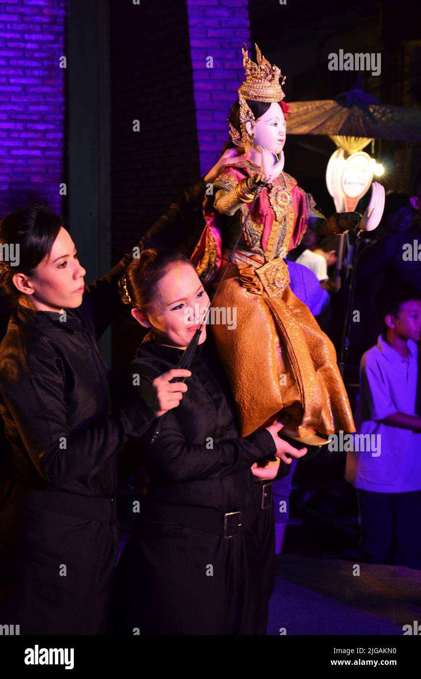Thai professional puppeteer or Puppet master manipulate playing acting ...