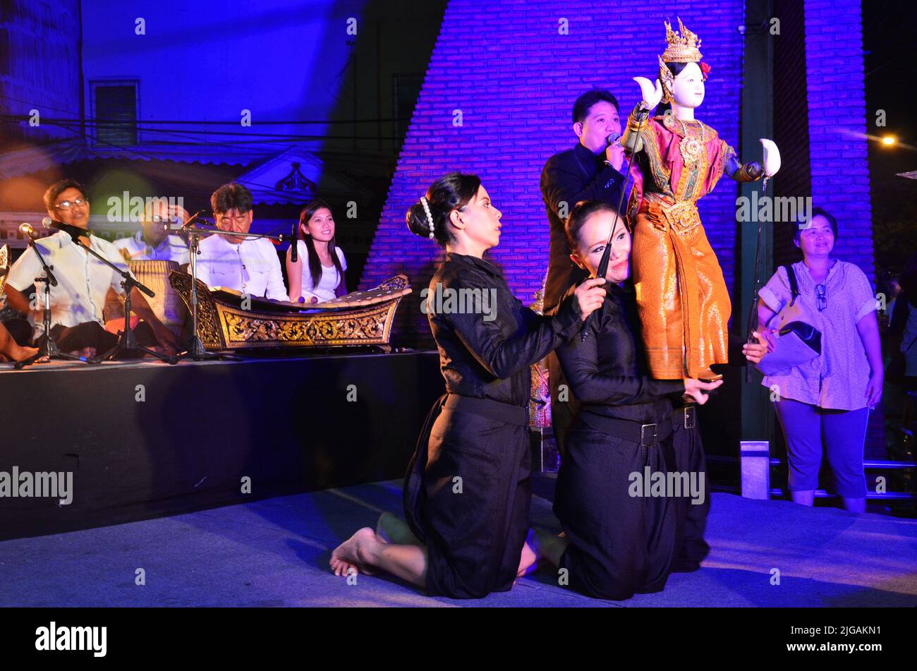 Thai professional puppeteer or Puppet master manipulate playing acting ...