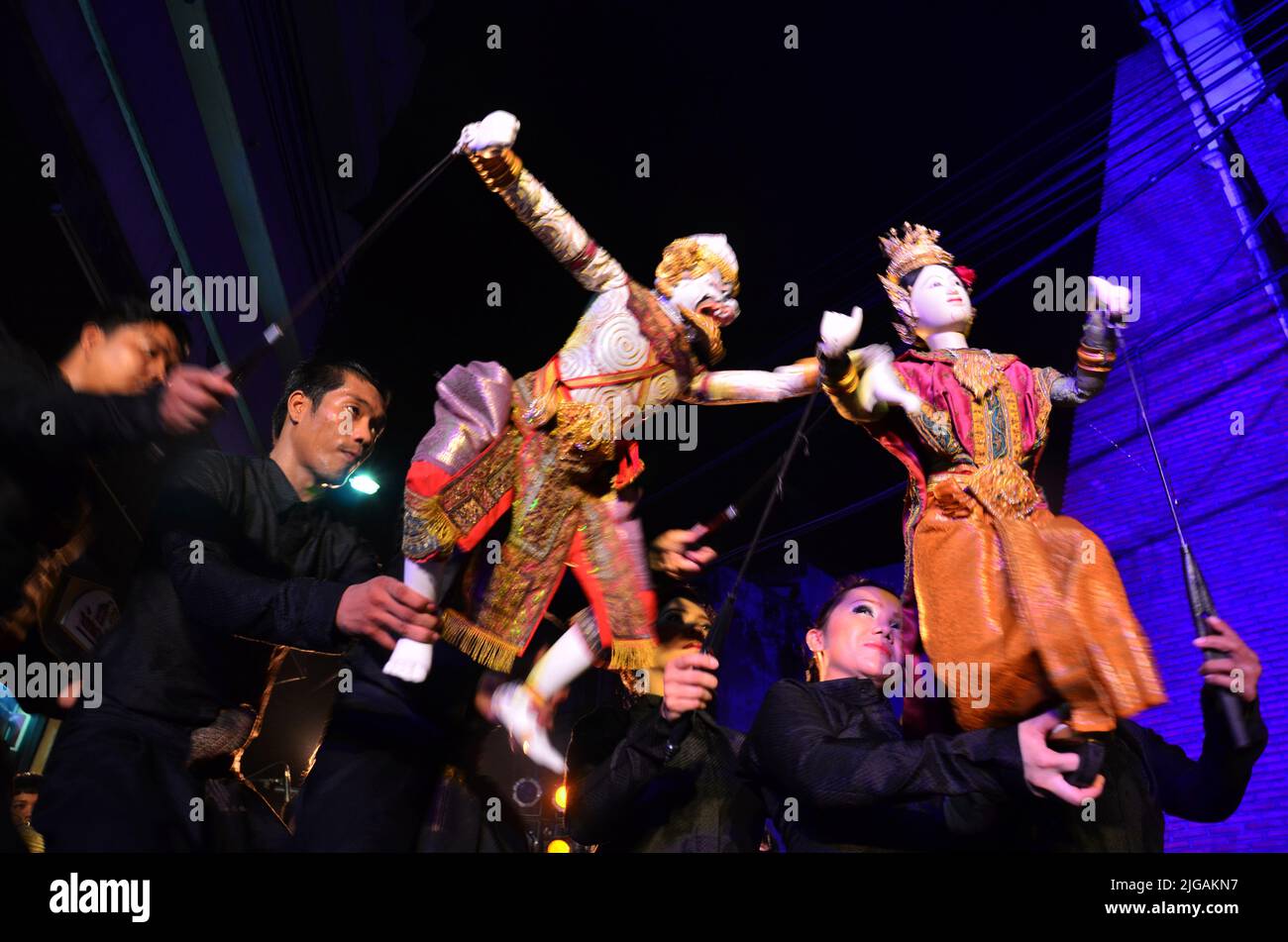 Thai professional puppeteer or Puppet master manipulate playing acting ...