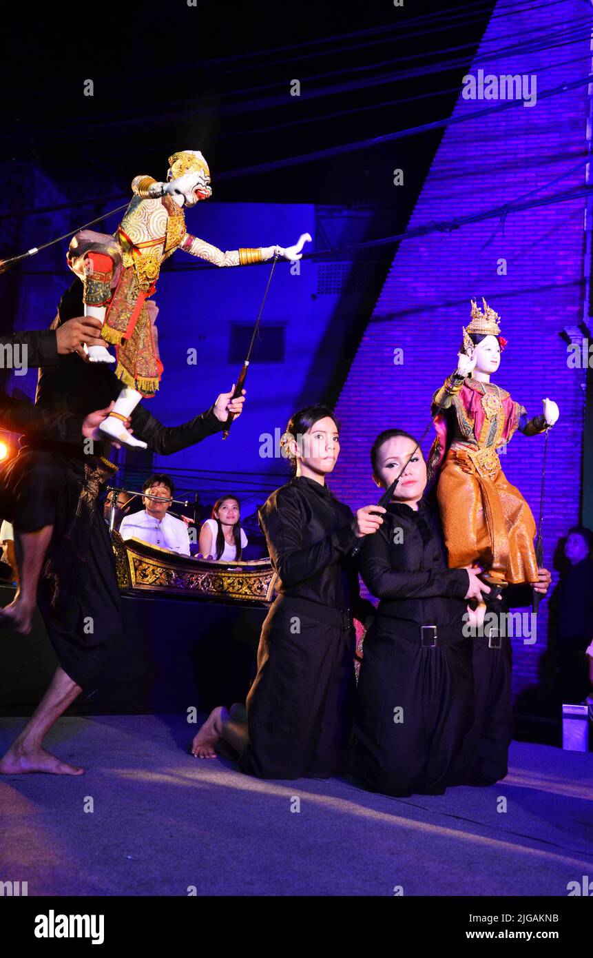 Thai professional puppeteer or Puppet master manipulate playing acting ...